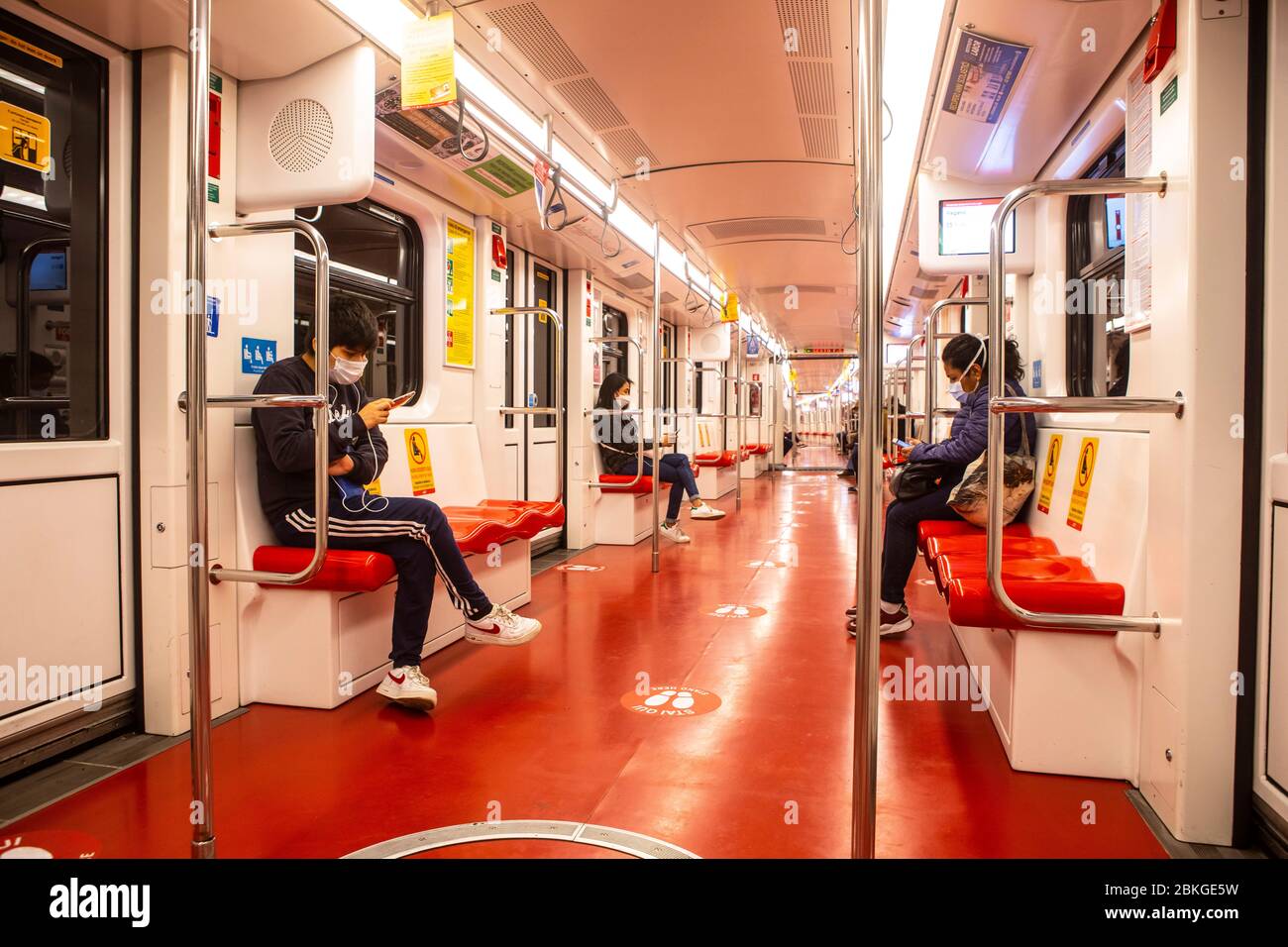 Milan, phase 2 covid-19 red metro. Social distancing on the Atm ...