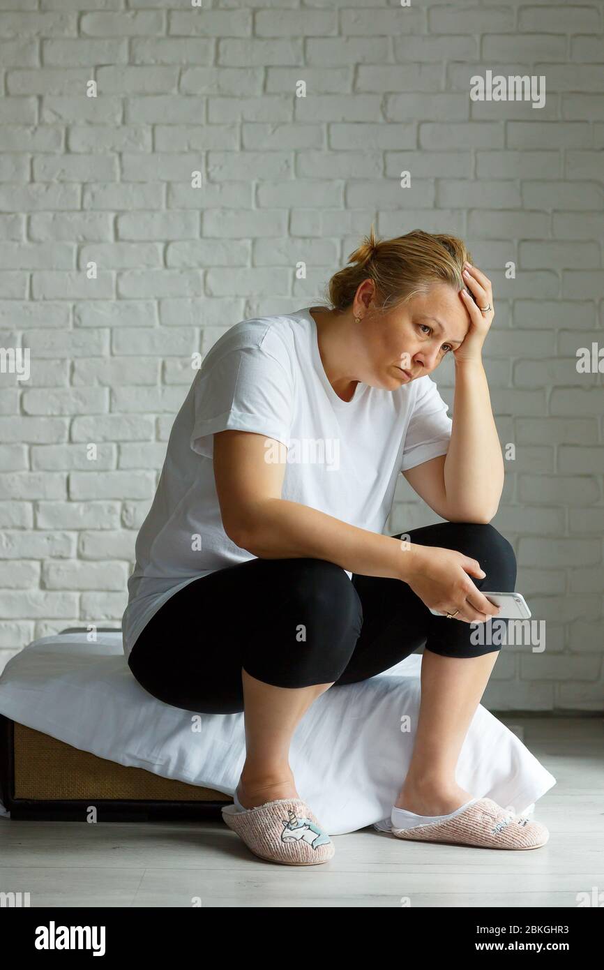 Upset Stressed Woman Holding Cellphone Disgusted With Message She