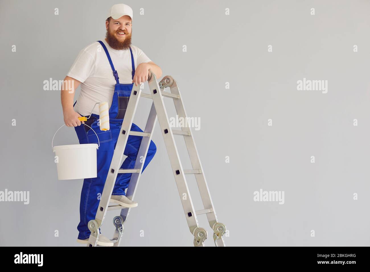 Fat man painting hi-res stock photography and images - Alamy