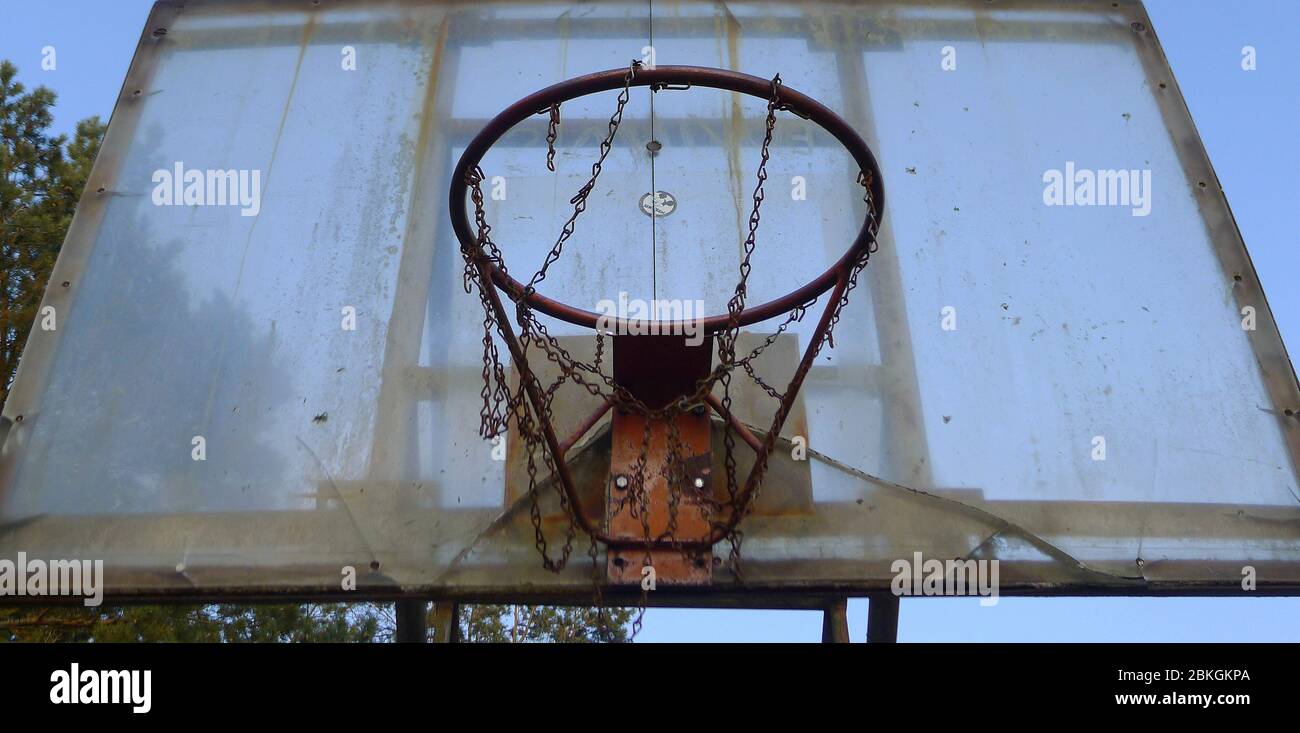 Outdoor Basketball Hoop in evening time. Outdoor basketball hoop and ...
