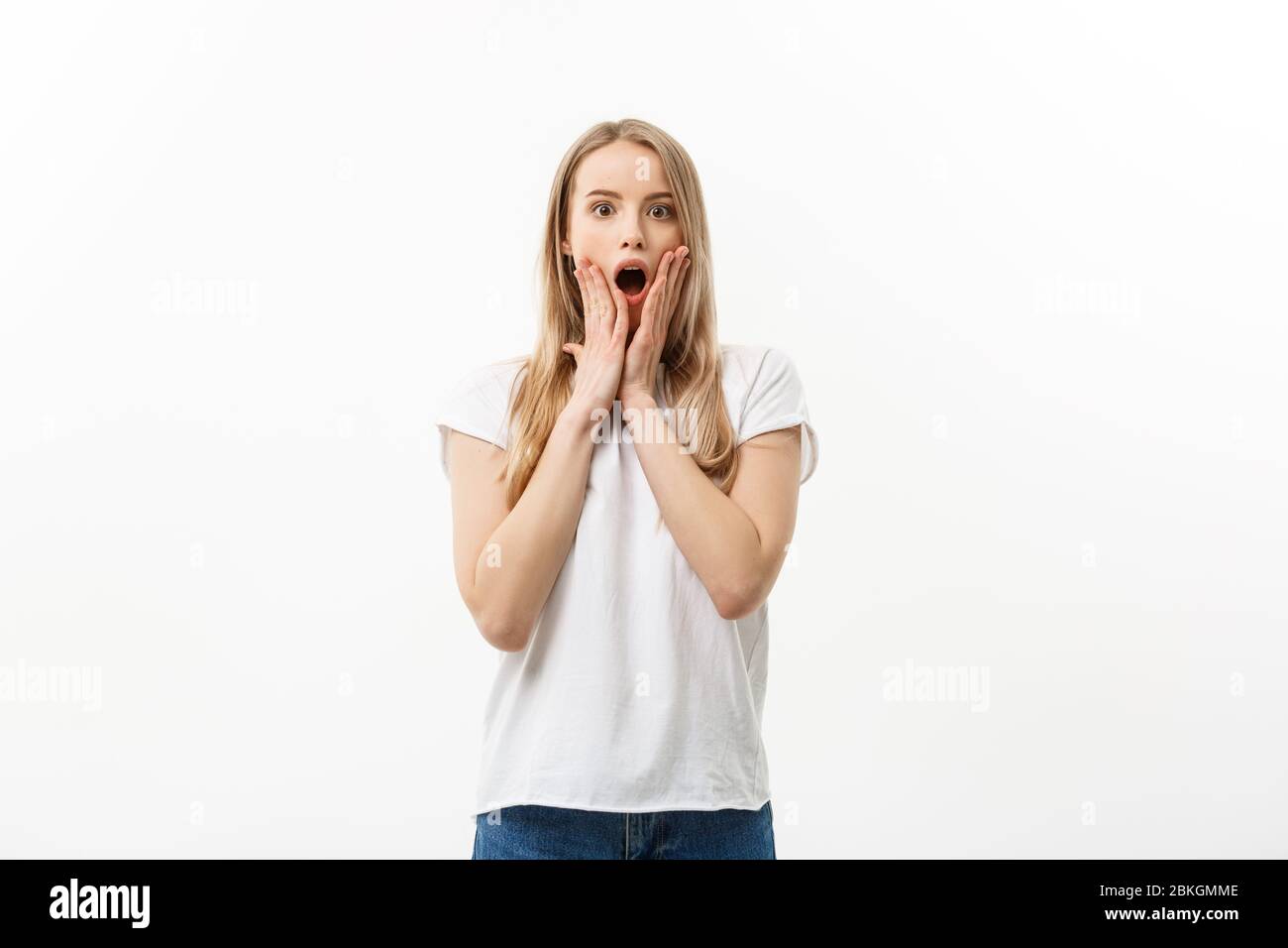 Lifestyle Concept: Portrait of a scared frightened girl standing and ...