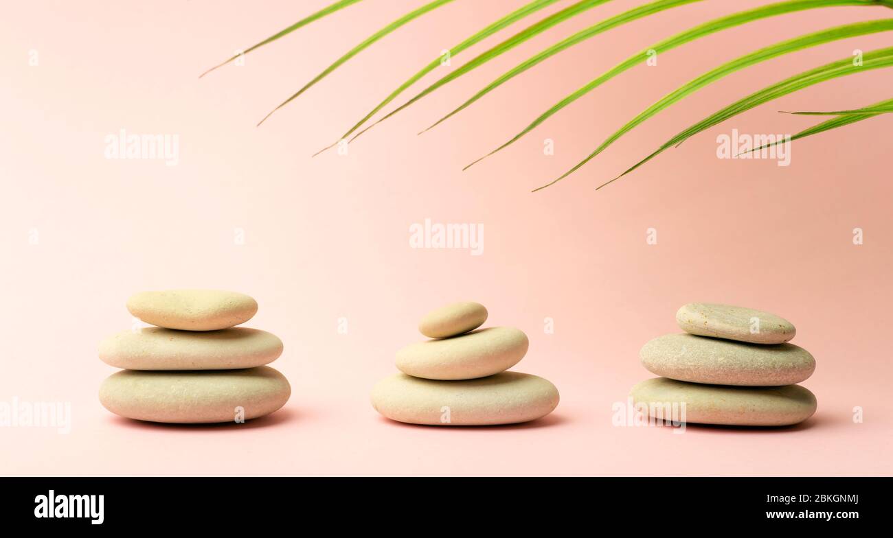 Zen background pink color with Japanese stones (stone towers) for spa ...