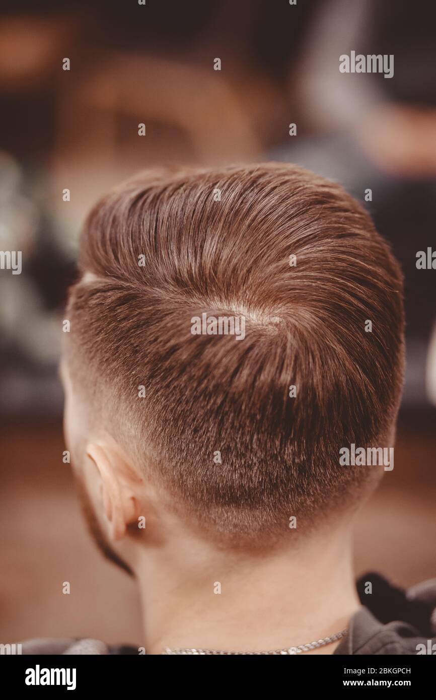 Vertical photo of man after barber, Hairstyle with parting Stock Photo ...