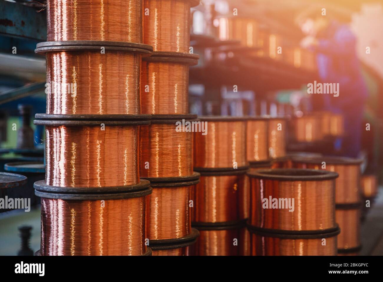 Production of copper wire, bronze cable in reels at factory Stock Photo ...
