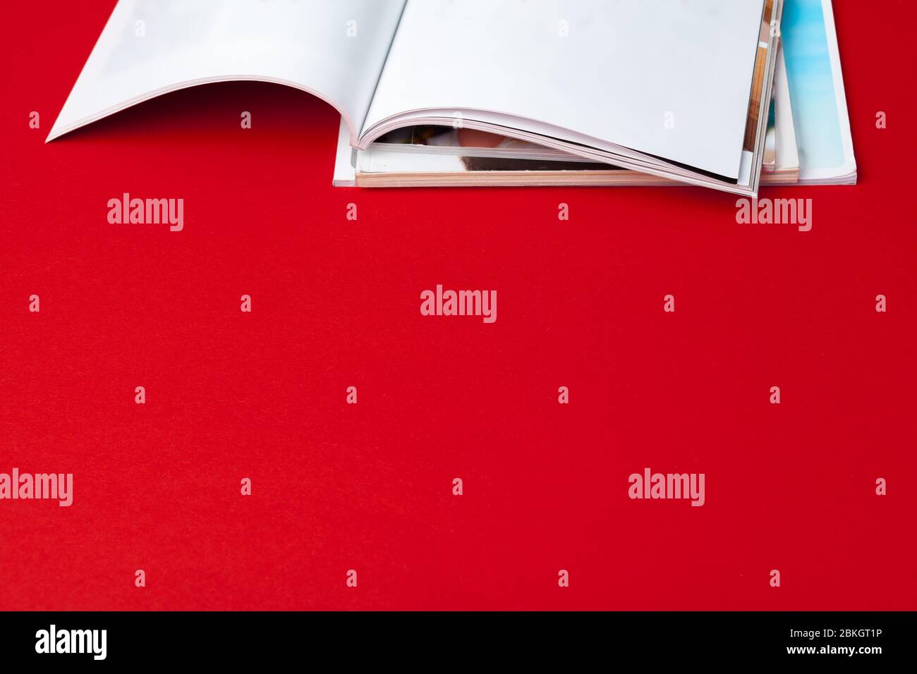 Close up stacking magazine place on table background Stock Photo - Alamy