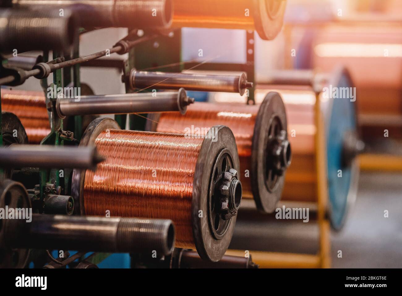 Production of copper wire, bronze cable in reels at factory Stock Photo ...