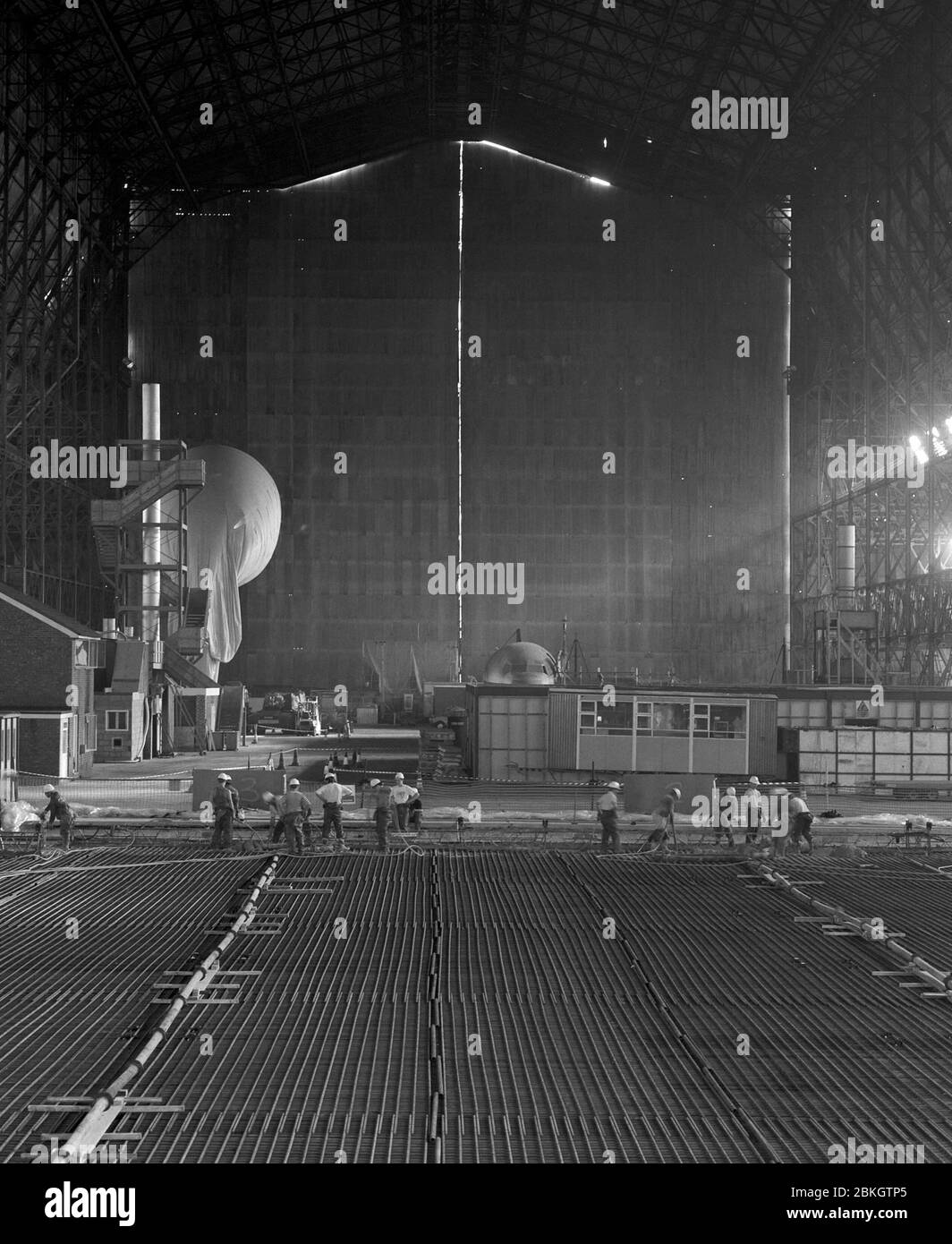 Pouring a new concrete floor at the R101 Airship hangar, at Cardington ...
