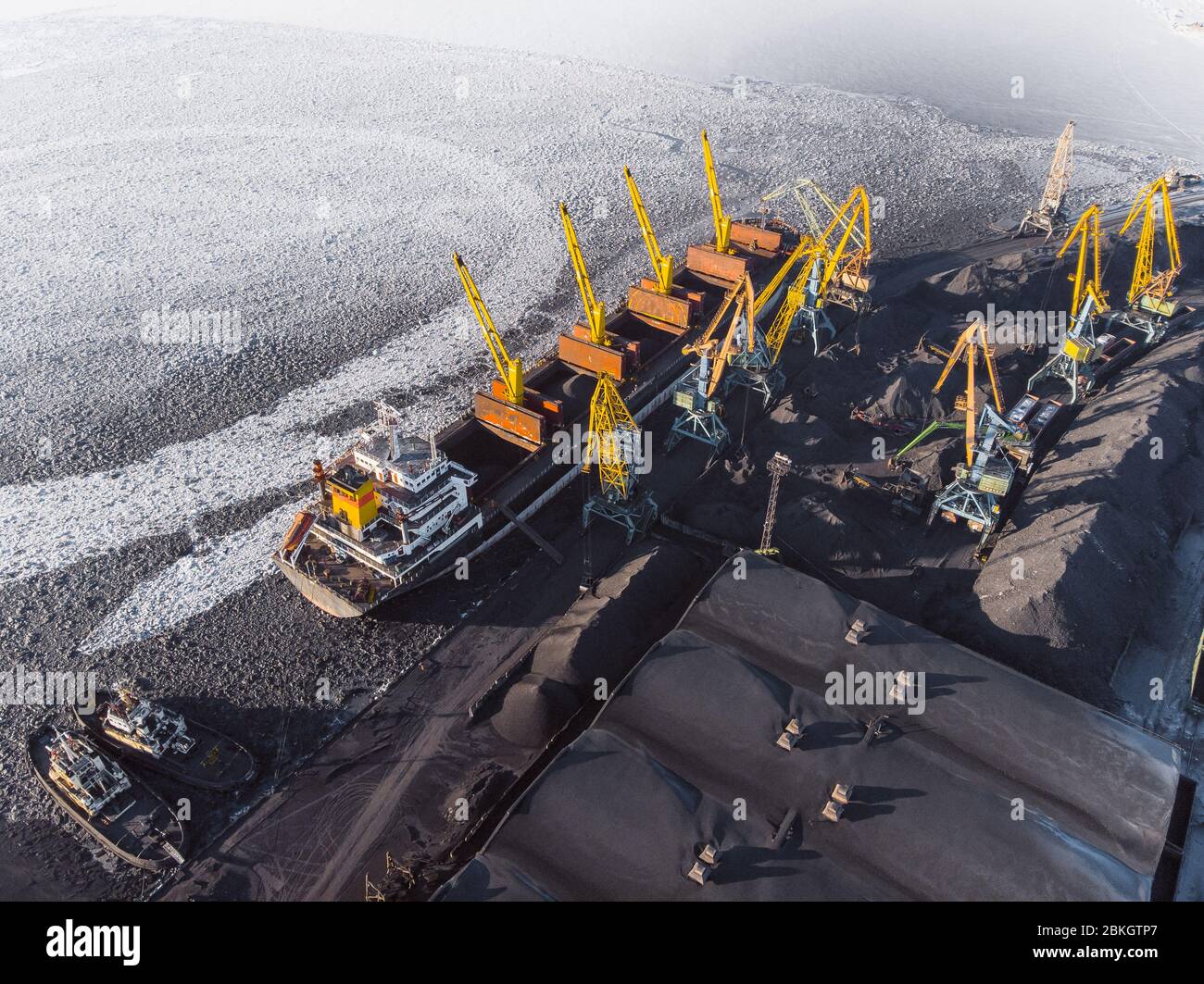 Industrial photo, Loading coal mining in port ship with crane. Aerial ...