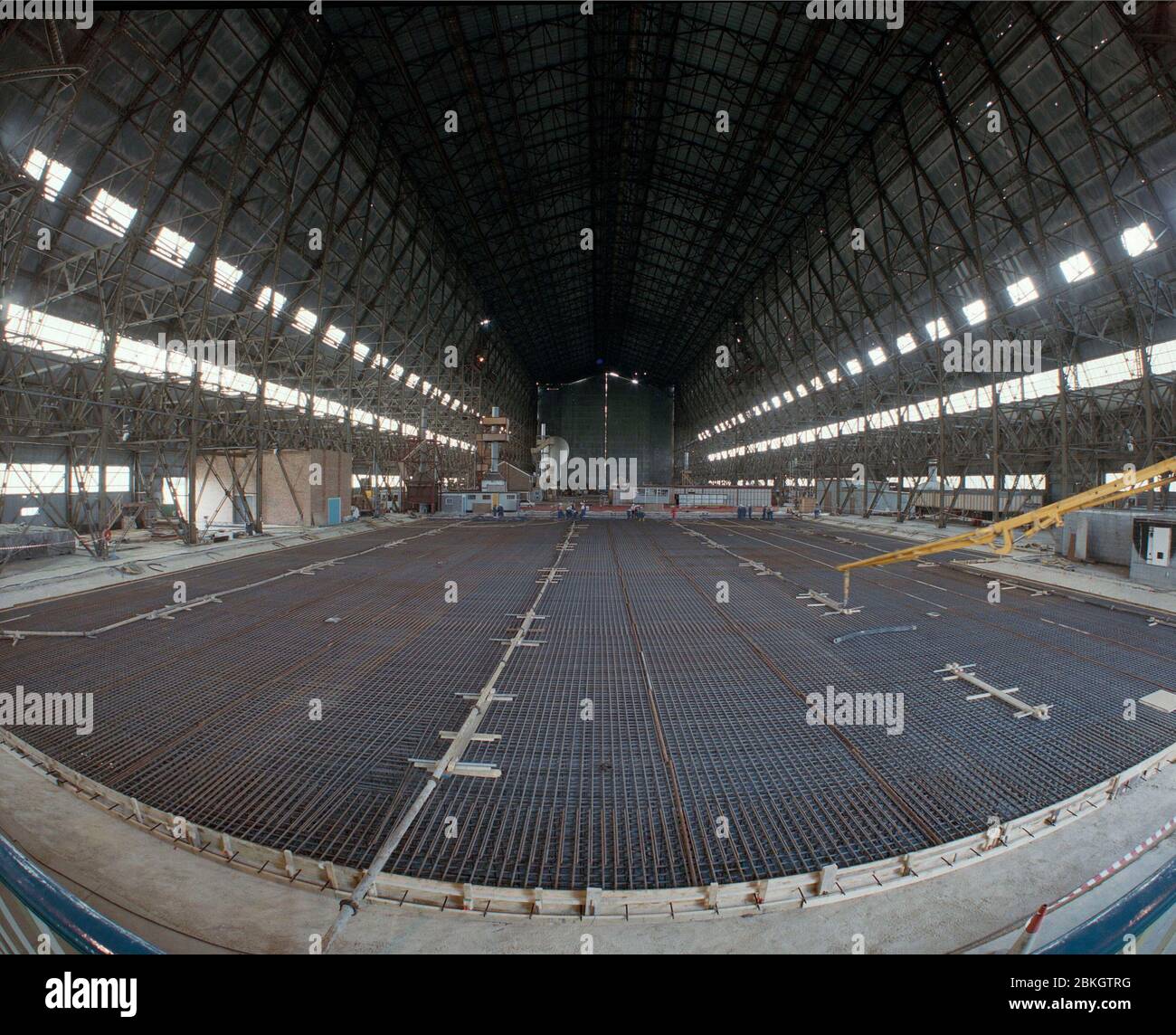 Pouring a new concrete floor at the R101 Airship hangar, at Cardington ...