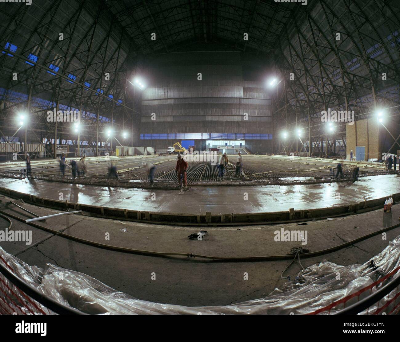 Pouring a new concrete floor at the R101 Airship hangar, at Cardington ...