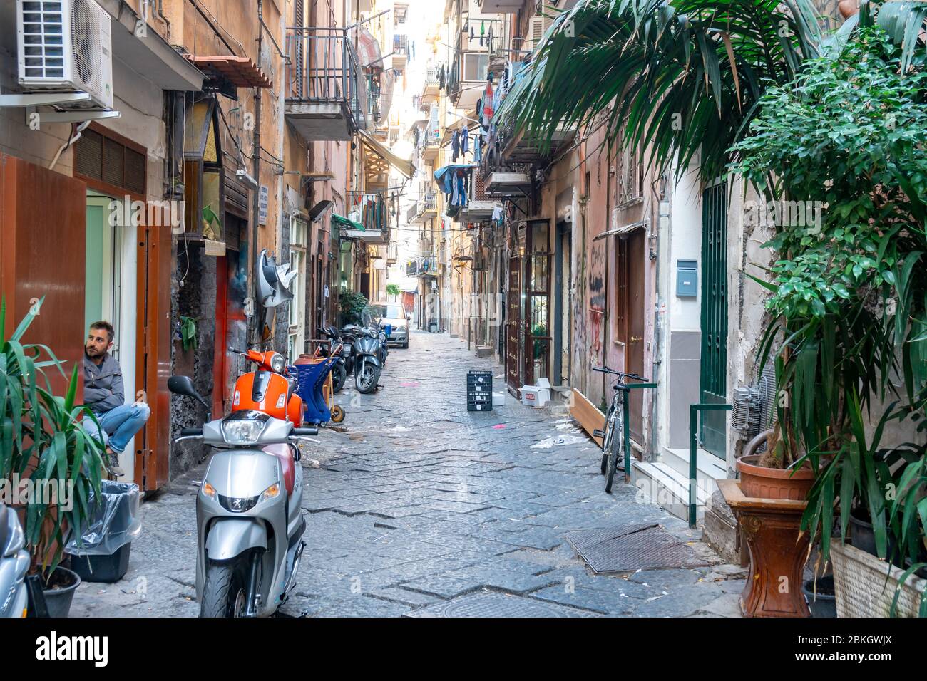 Naples, Italy - 30 October, 2019: Old dirty streets of Naples, people ...