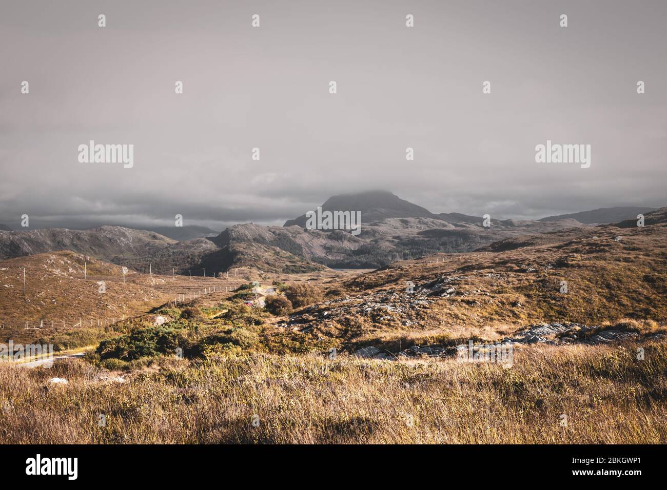 Cloud capped Ben Stack peak at bright autumnal day in North West ...