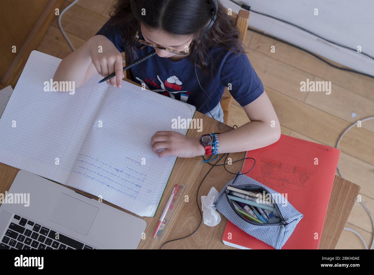 Girl attending online school classes from home Stock Photo - Alamy