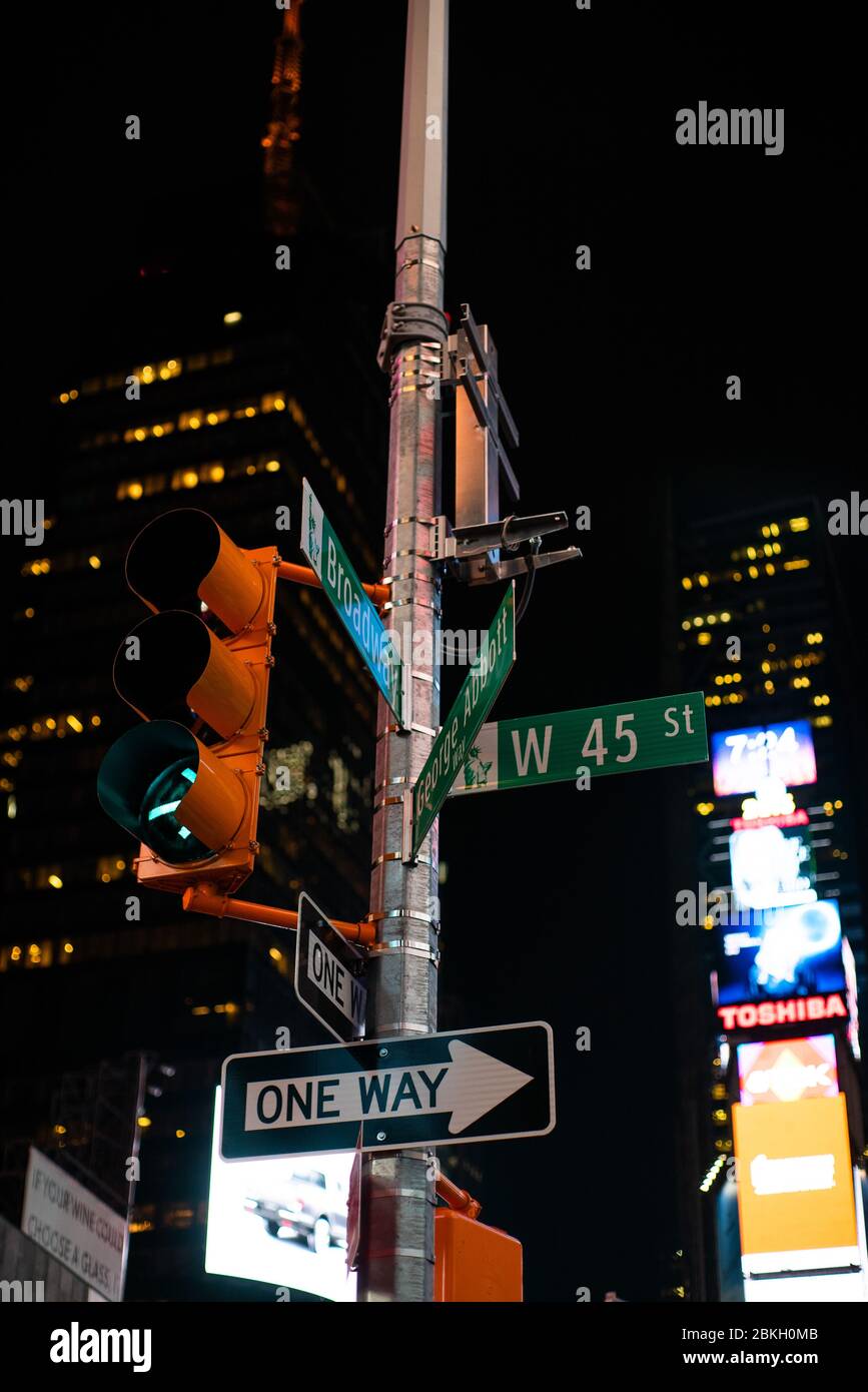 View of street signs on traffic light pole Stock Photo - Alamy