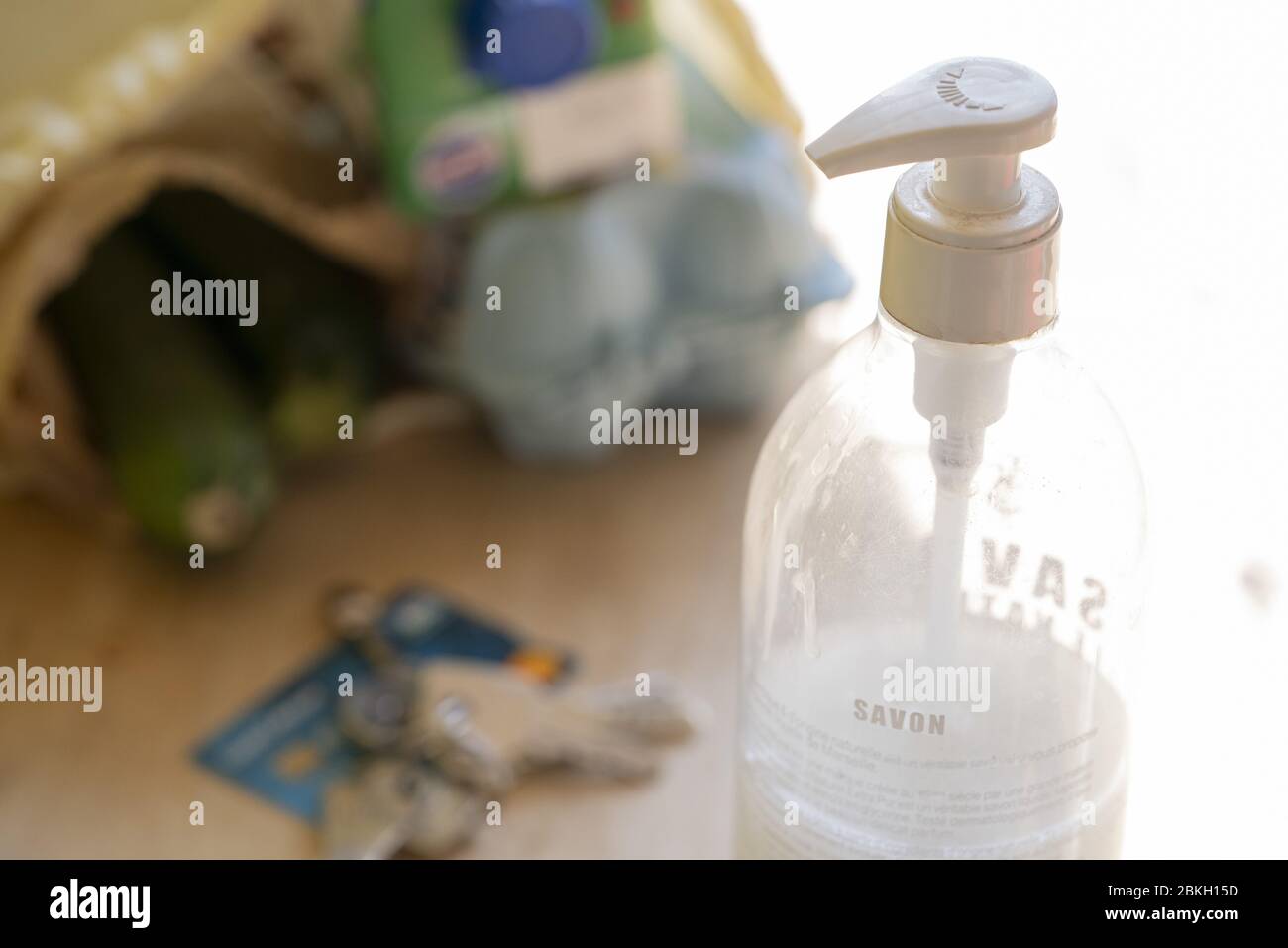 Liquid soap dispenser on table Stock Photo - Alamy