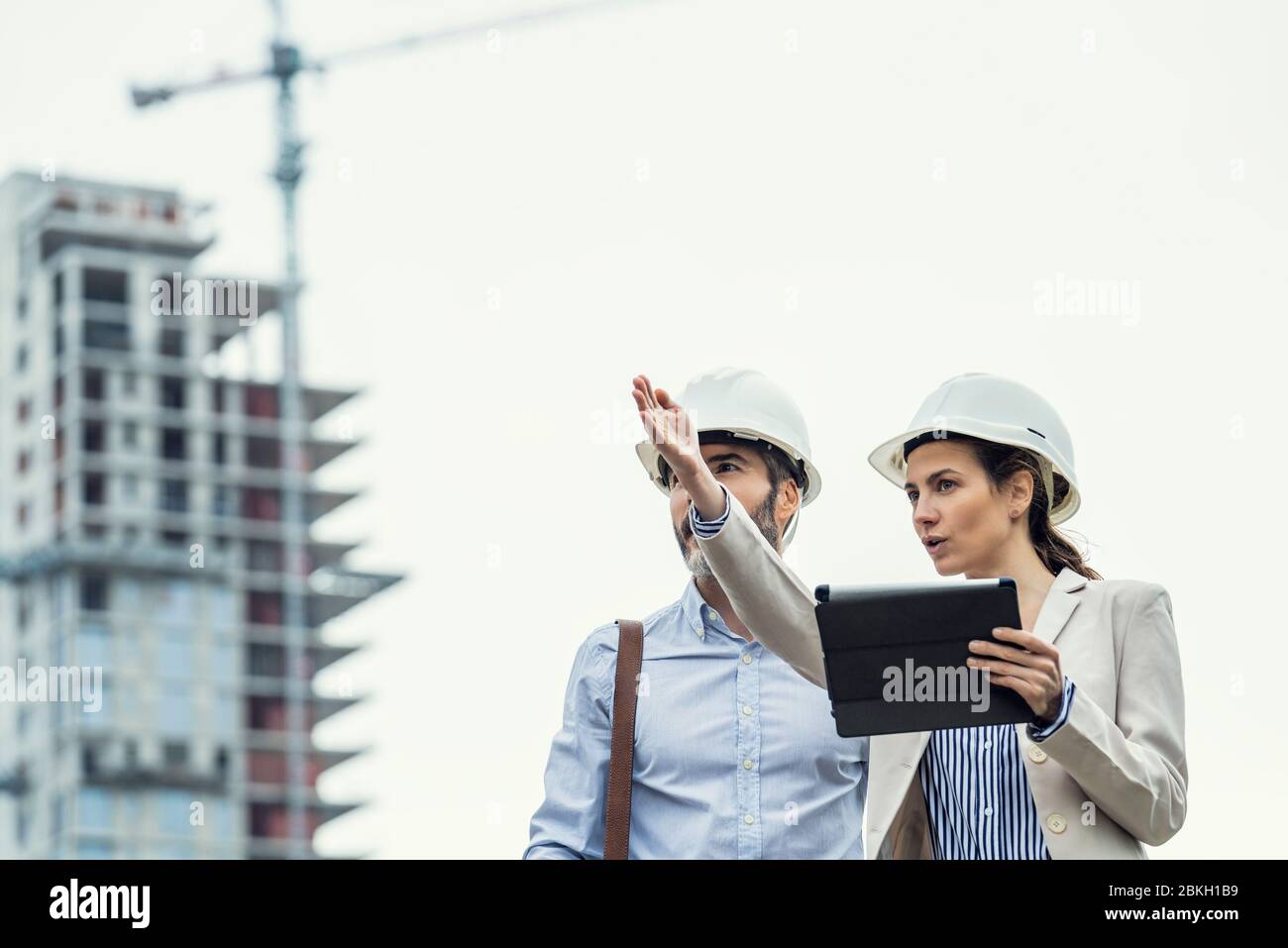 Architects talking construction hi-res stock photography and images - Alamy