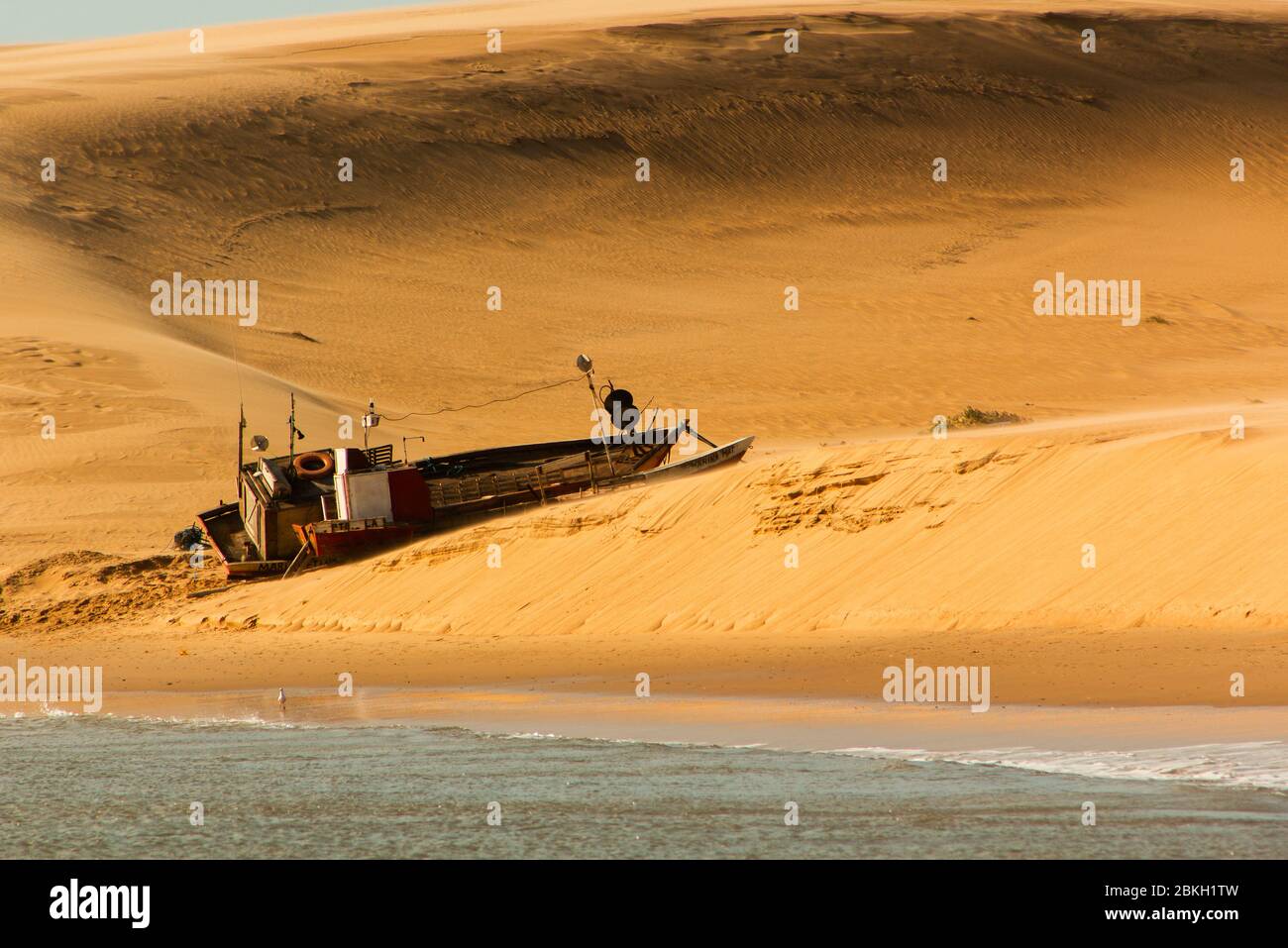 View of boat on beach Stock Photo - Alamy