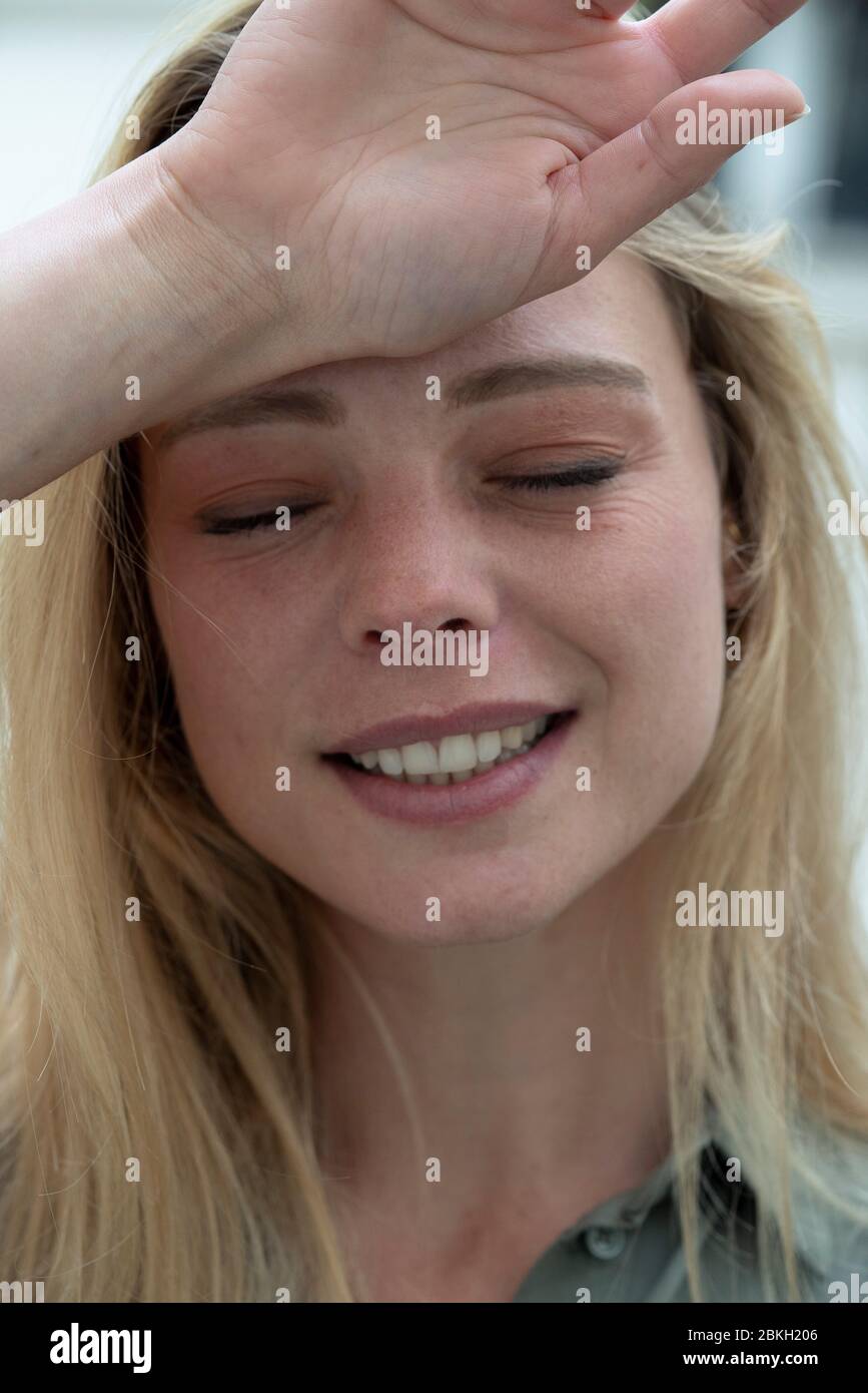 Close up touching forehead hi-res stock photography and images - Alamy