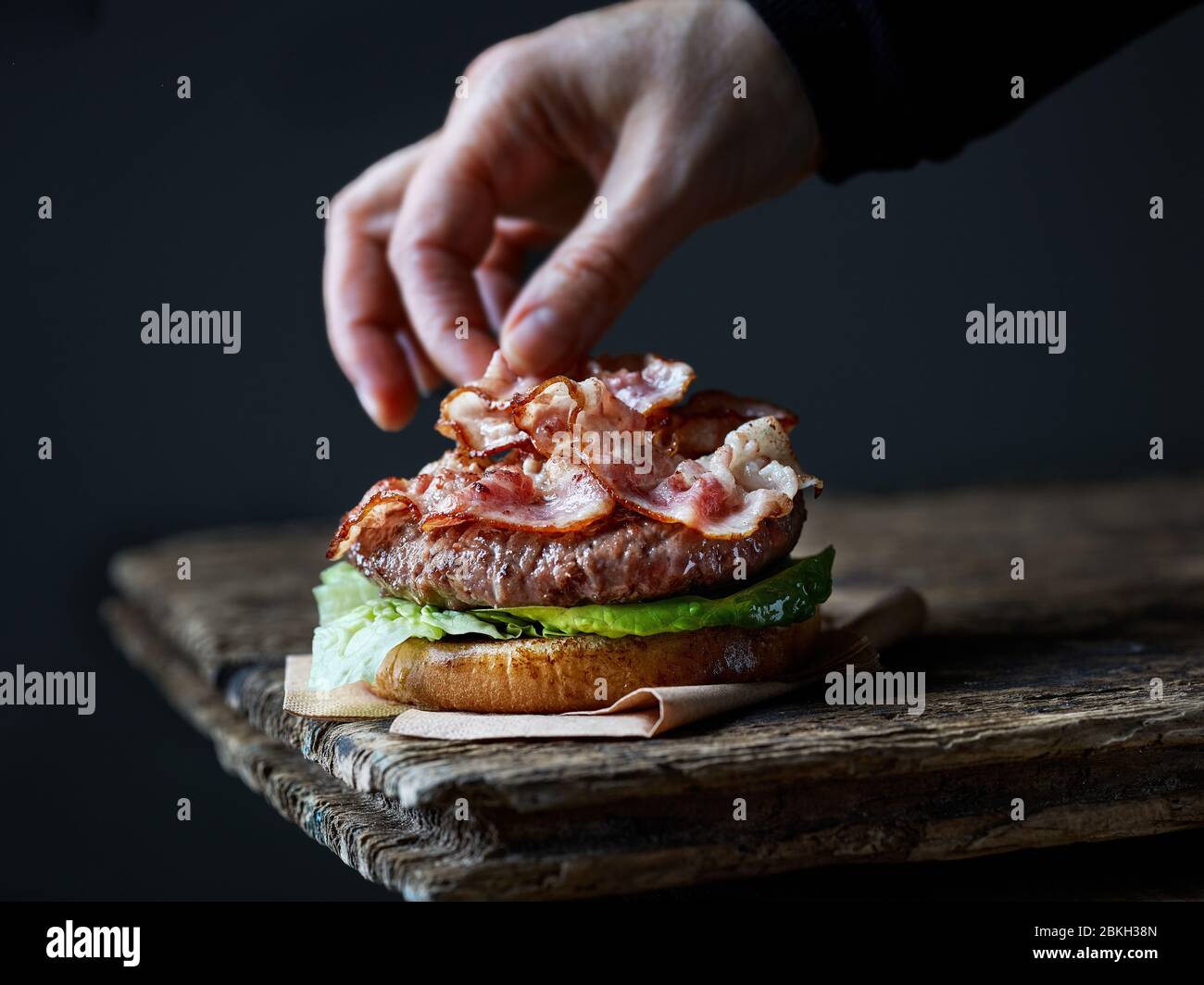 Burger making process hi-res stock photography and images - Alamy