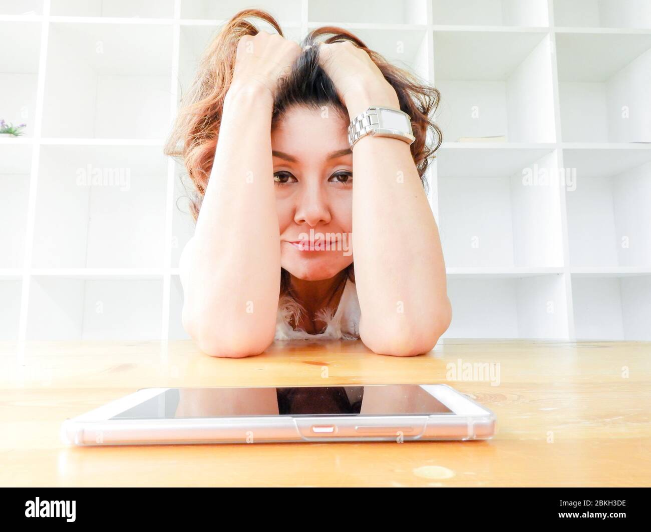 Beautiful woman smiling happy against white background and two hands ...