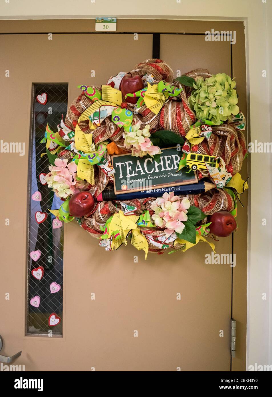 Teacher wreath on a school classroom door Stock Photo - Alamy