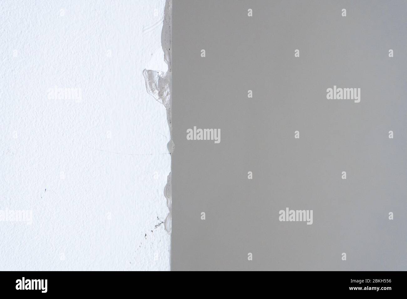 The corner of the wall is chipped plaster. Repair needed Stock Photo ...