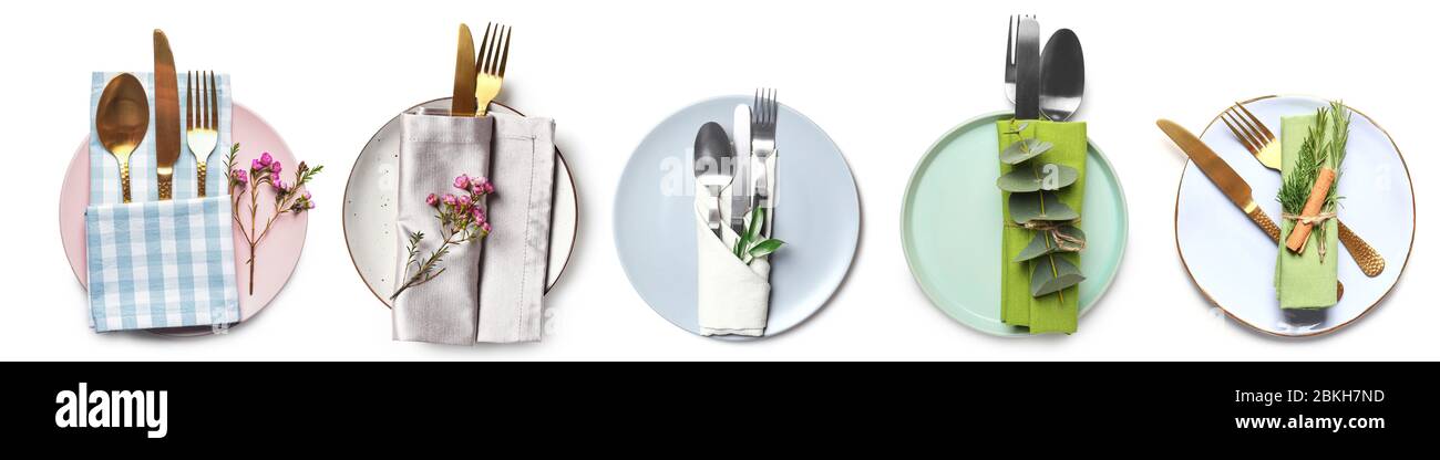 Set of different table settings on white background Stock Photo - Alamy