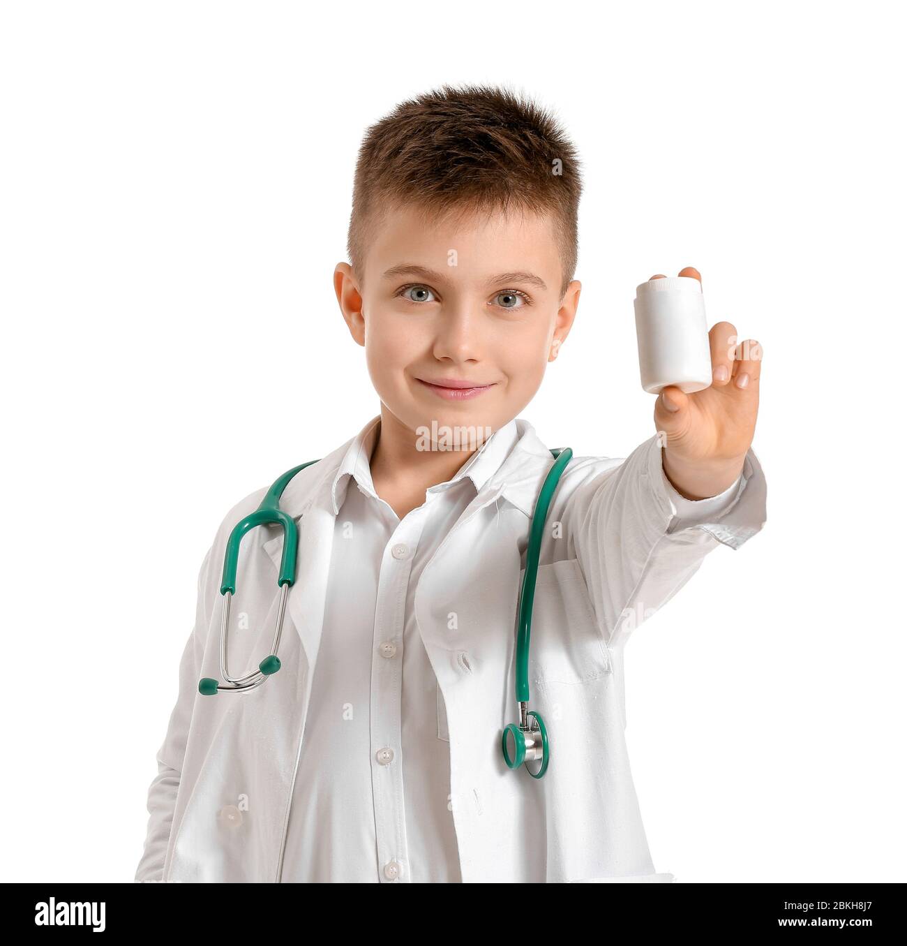 Cute little doctor on white background Stock Photo - Alamy