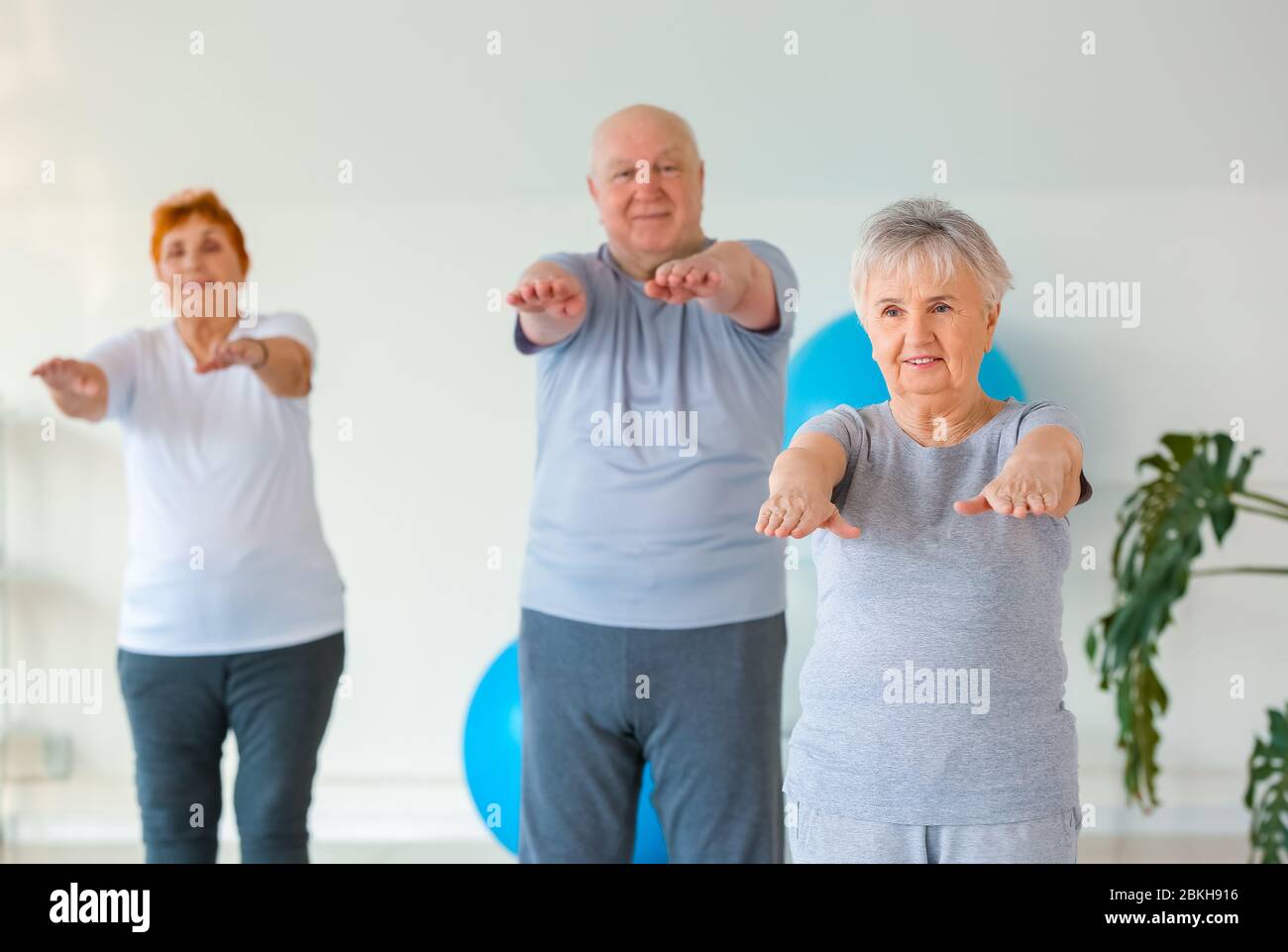 Elderly people exercising in gym Stock Photo - Alamy