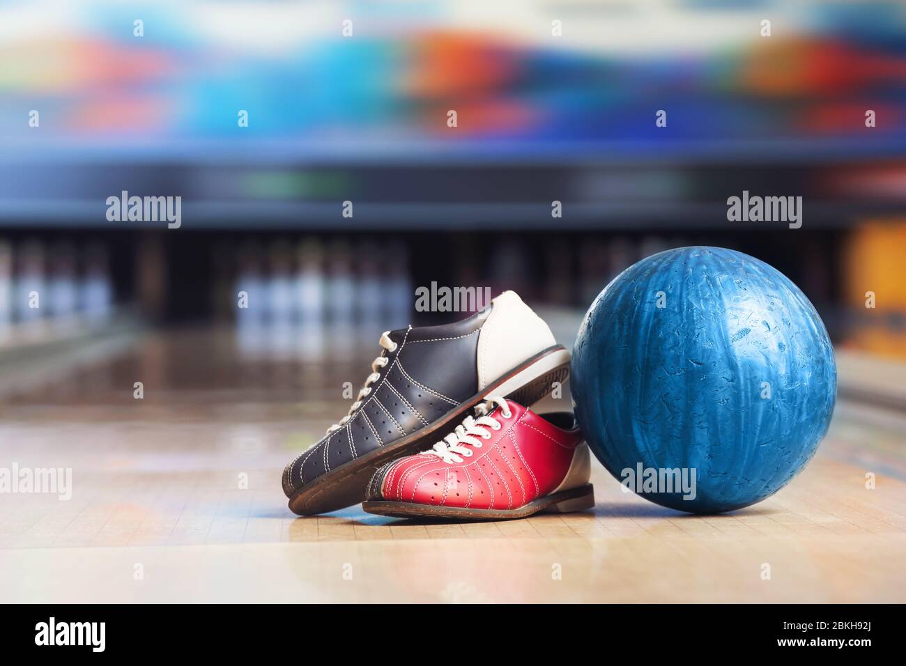 Shoes and ball on floor in bowling club Stock Photo - Alamy