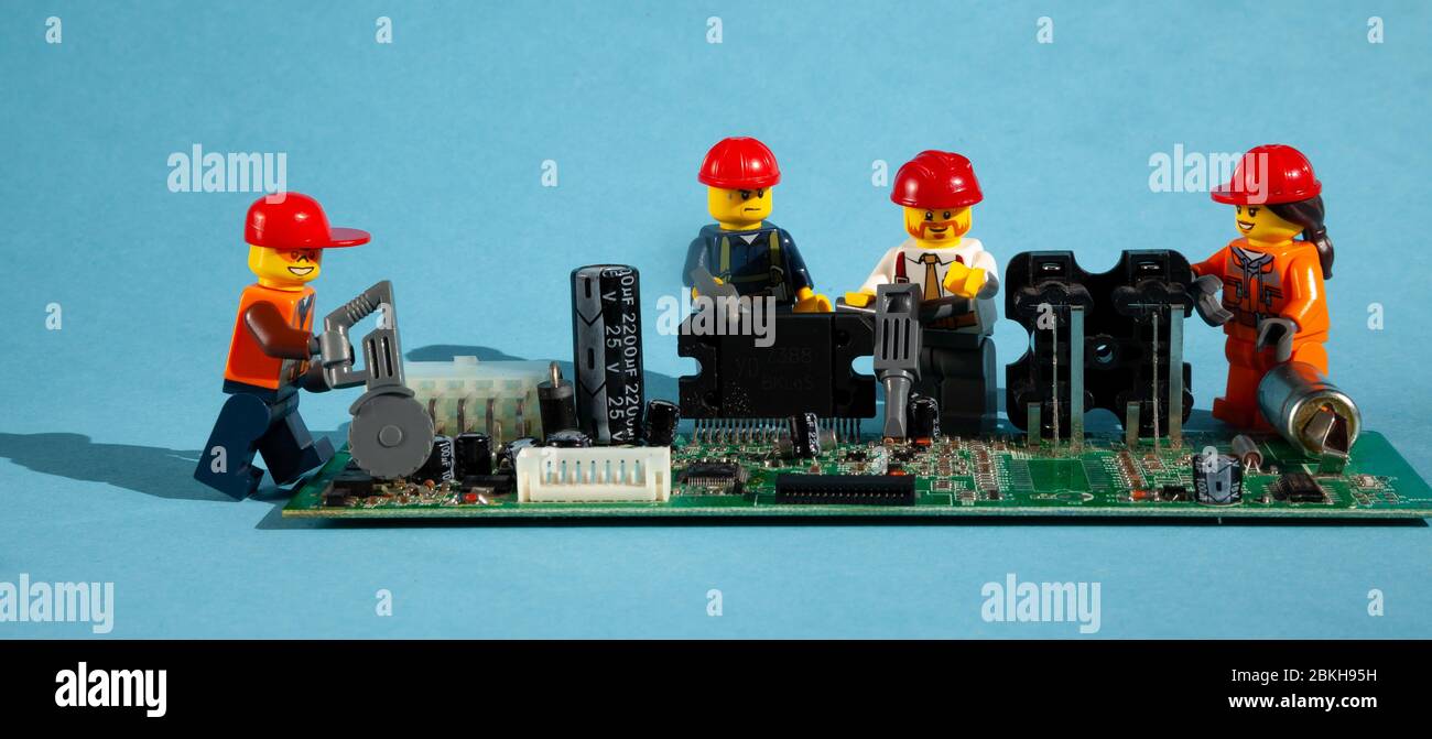 Ukraine, Kyiv - April 6, 2020: Computer repair LEGO men. Workers and ...
