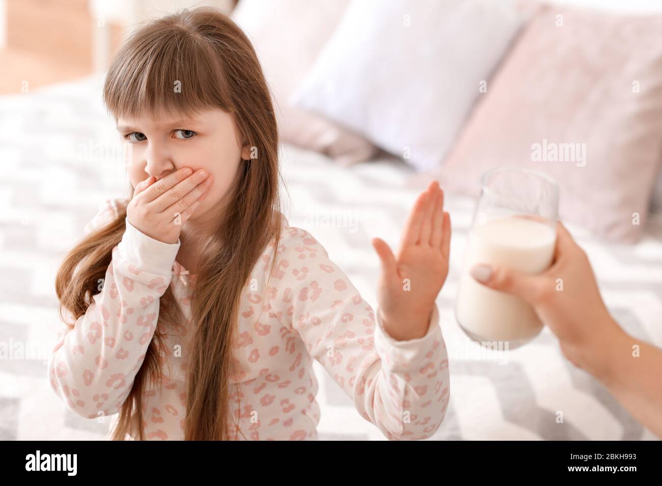 Little girl with milk allergy in bedroom Stock Photo - Alamy