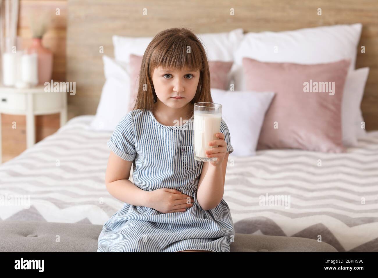 Little girl with milk allergy in bedroom Stock Photo - Alamy