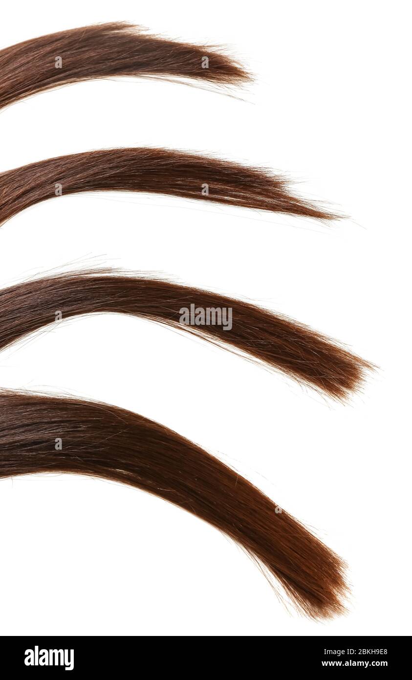 Strands of beautiful straight hair on white background Stock Photo - Alamy