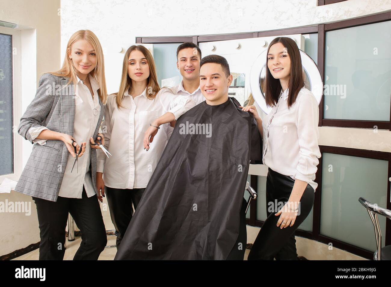 Professional hairdresser teaching in hair hi-res stock photography and ...