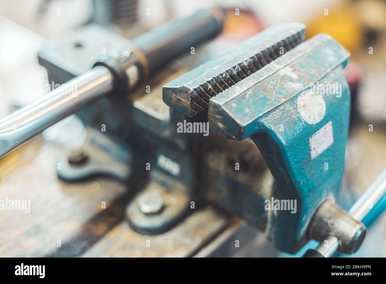Close up of a metal vice in a garage workshop Stock Photo - Alamy
