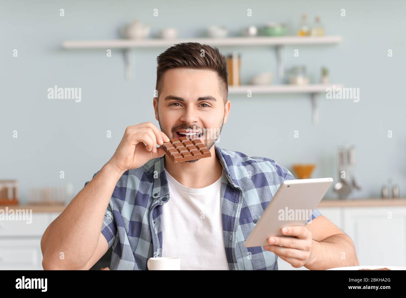 Man using candy hi-res stock photography and images - Alamy