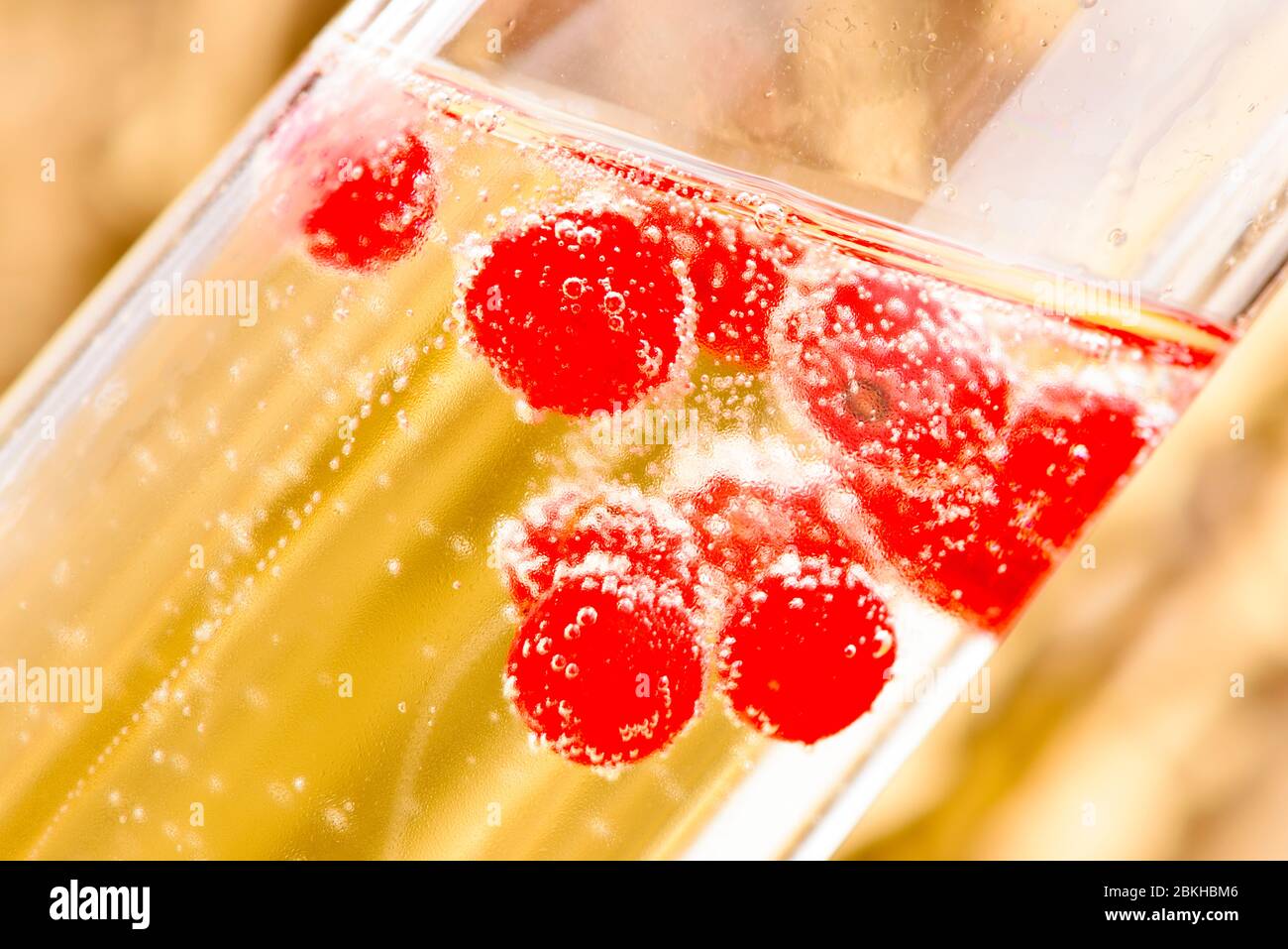 red fruits in sparkling champagne Stock Photo - Alamy
