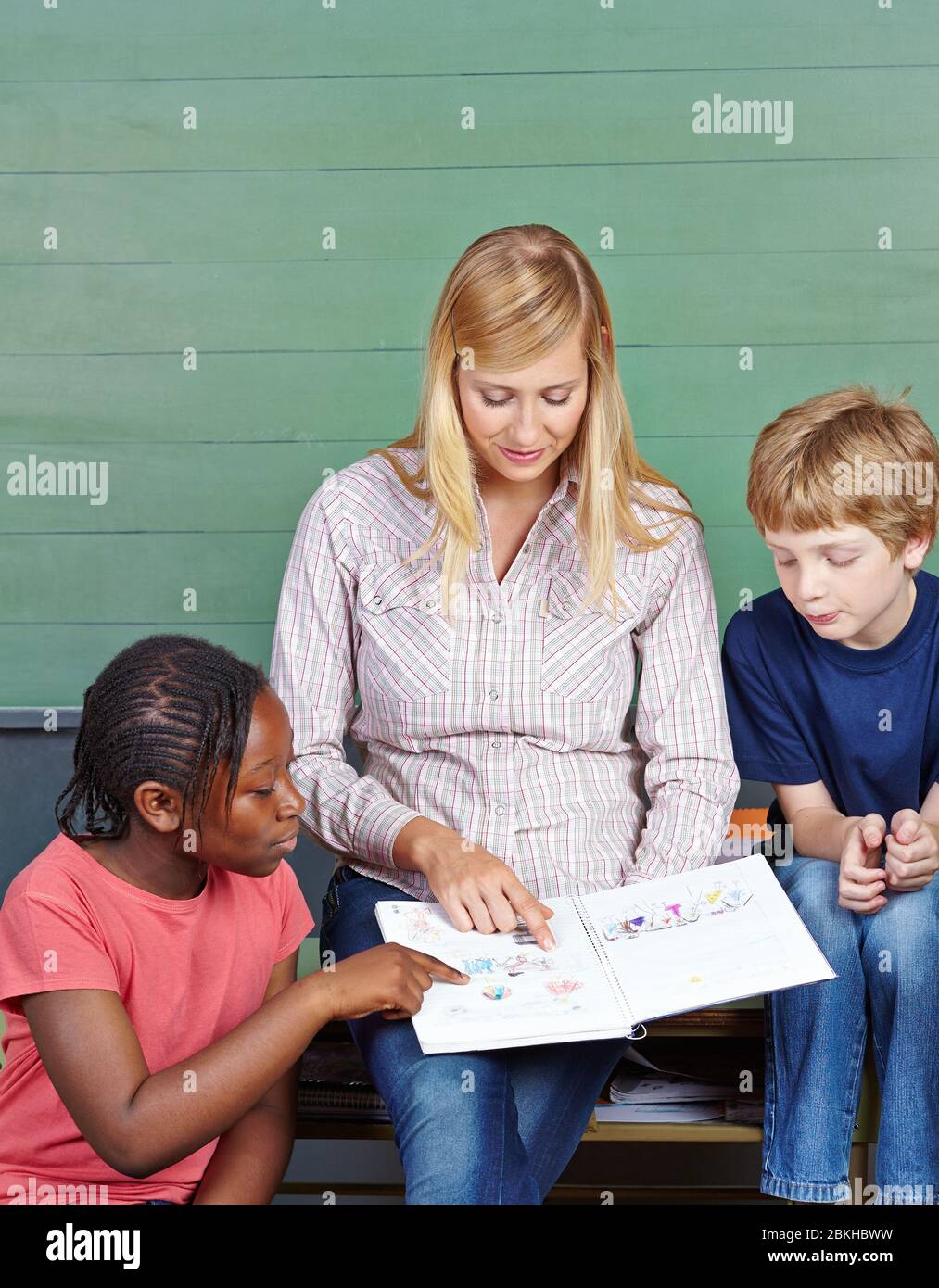 Two teacher and students hi-res stock photography and images - Alamy