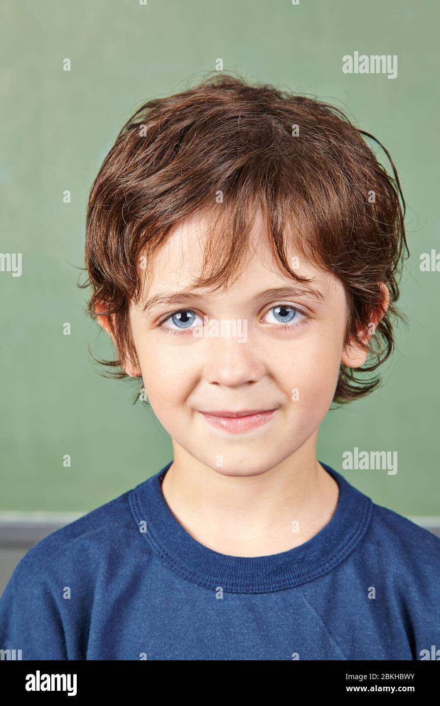 Child in front of classroom hi-res stock photography and images - Alamy