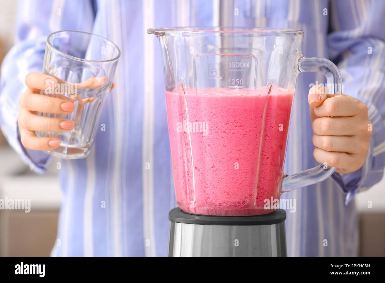 Girl pouring smoothie glass hi-res stock photography and images - Alamy
