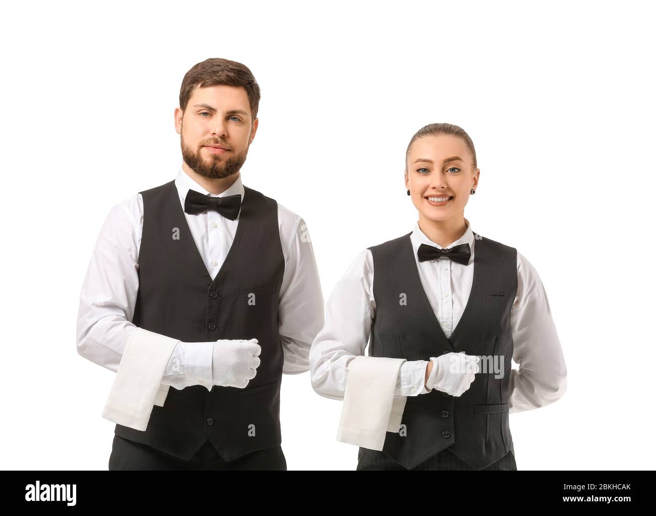Male and female waiters on white background Stock Photo - Alamy