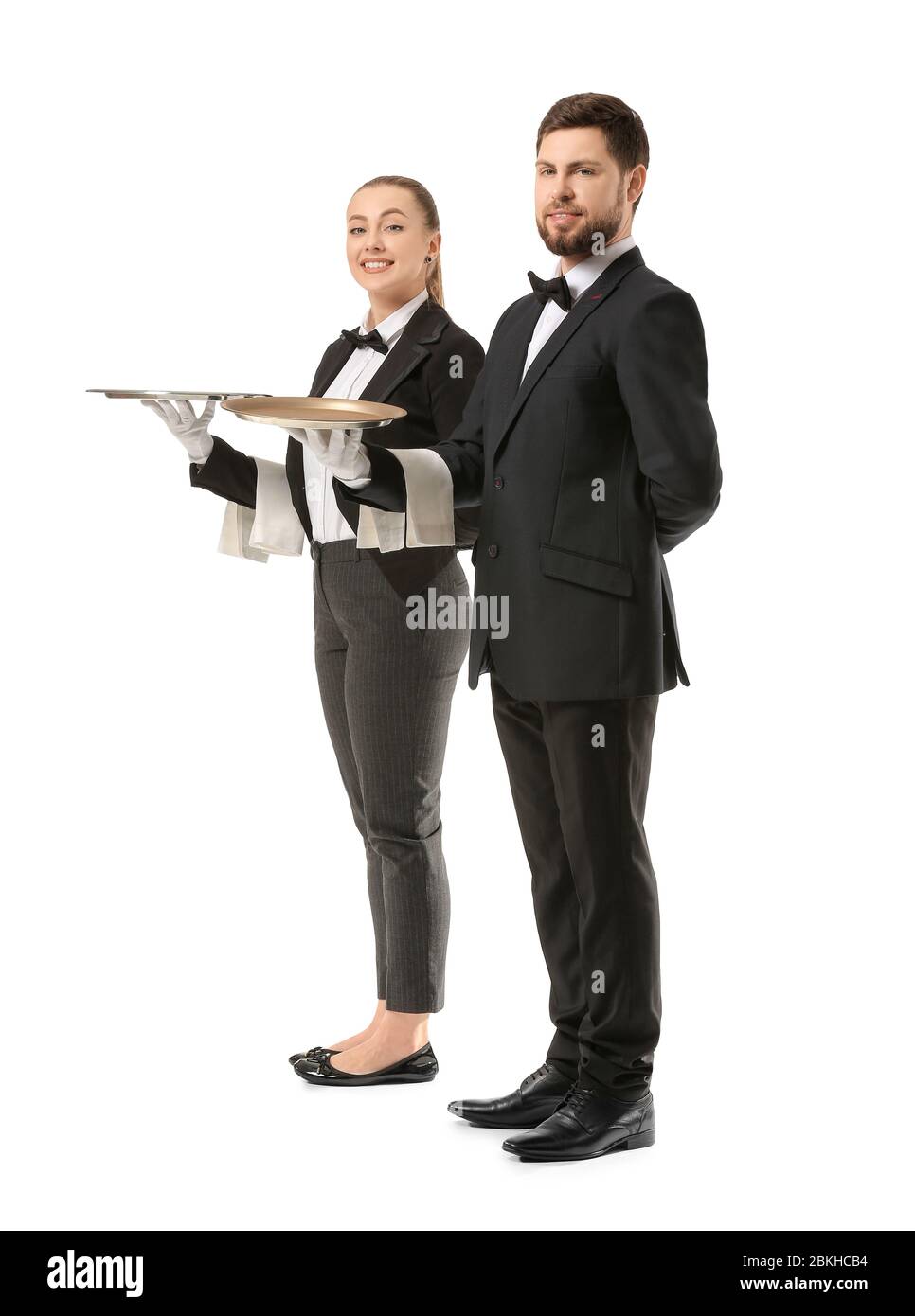 Male and female waiters on white background Stock Photo - Alamy