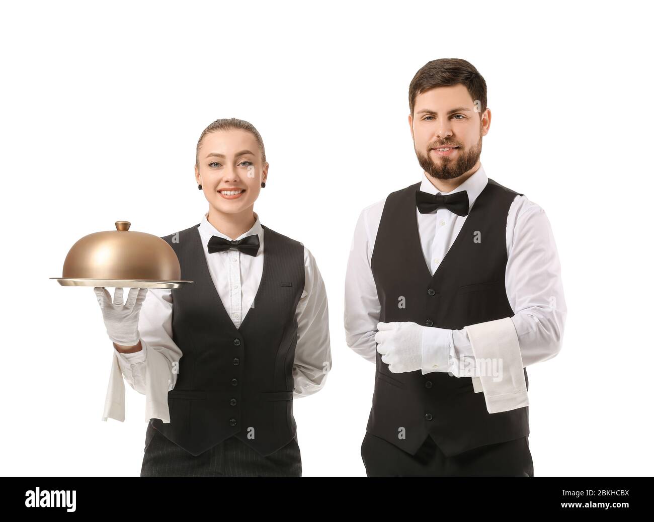 Male and female waiters on white background Stock Photo - Alamy