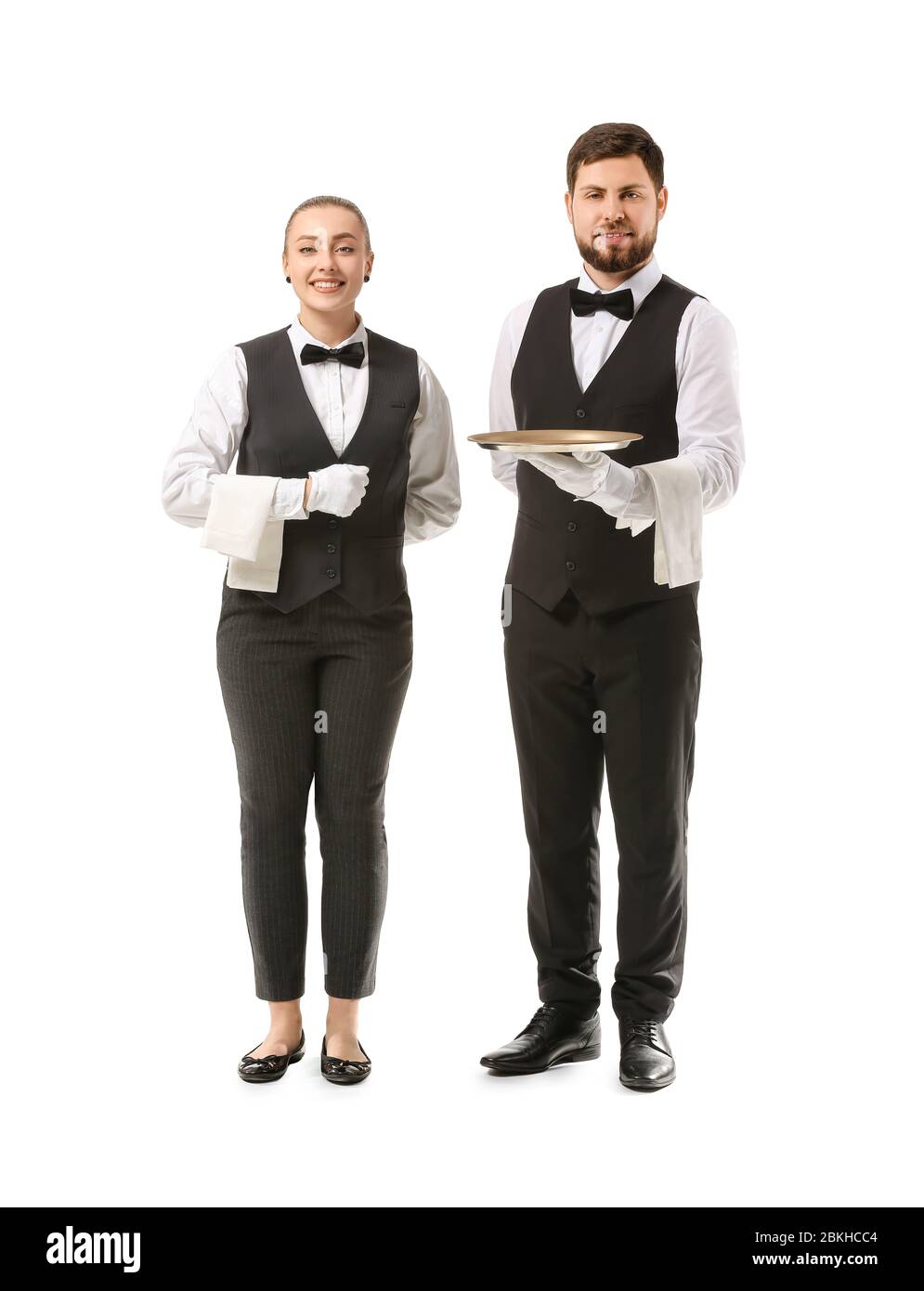 Male and female waiters on white background Stock Photo - Alamy