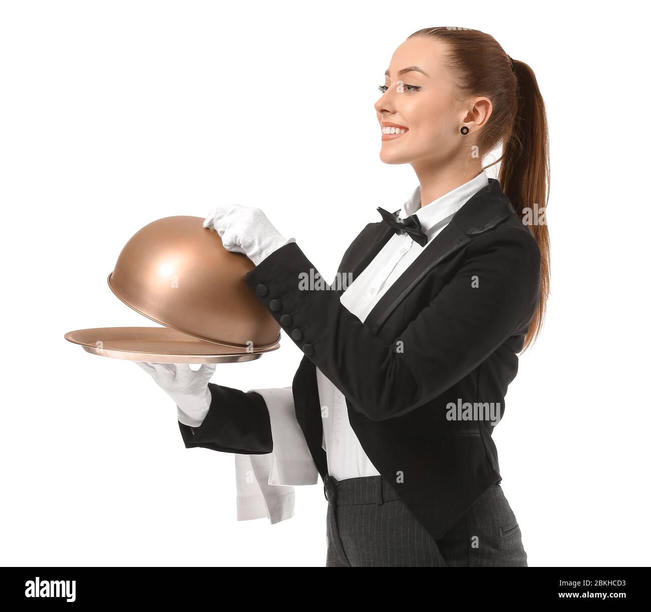 Beautiful female waiter on white background Stock Photo - Alamy