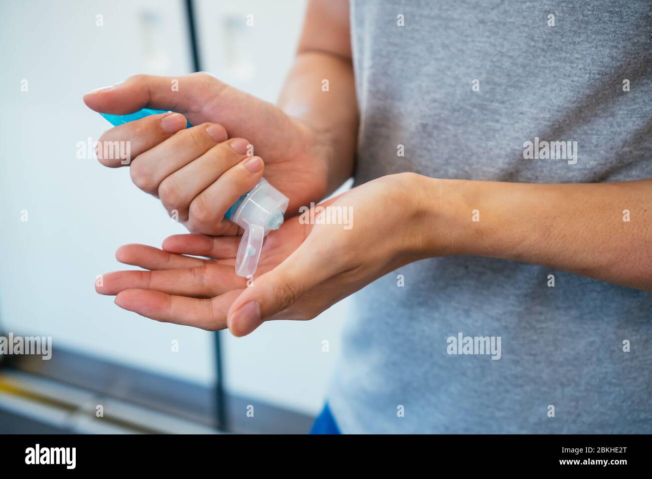 Man washing hands and applying alcohol gel to clean and get rid of germ ...