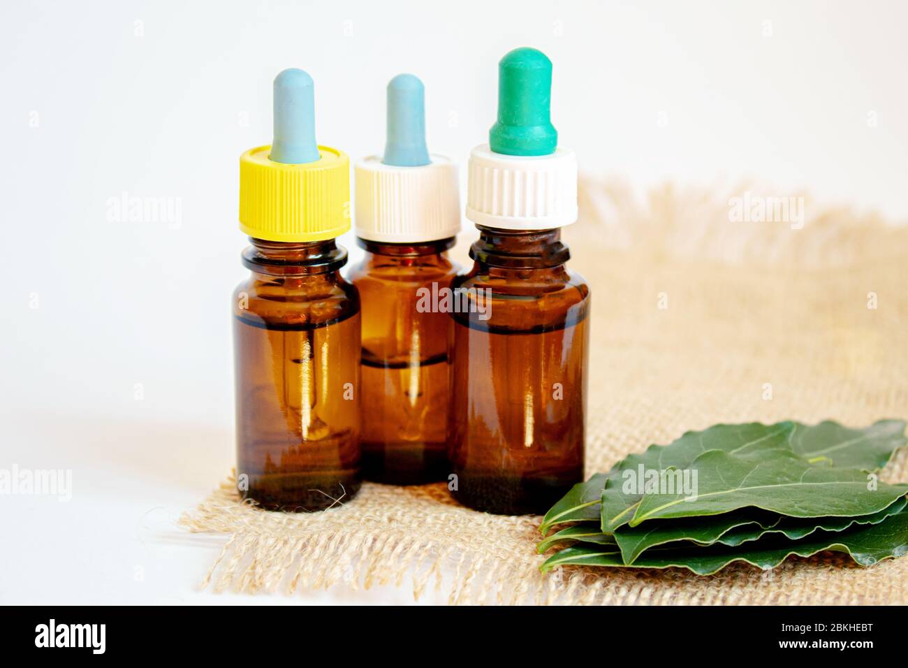 Tea tree essential oil in a small bottle. Selective focus.nature Stock ...