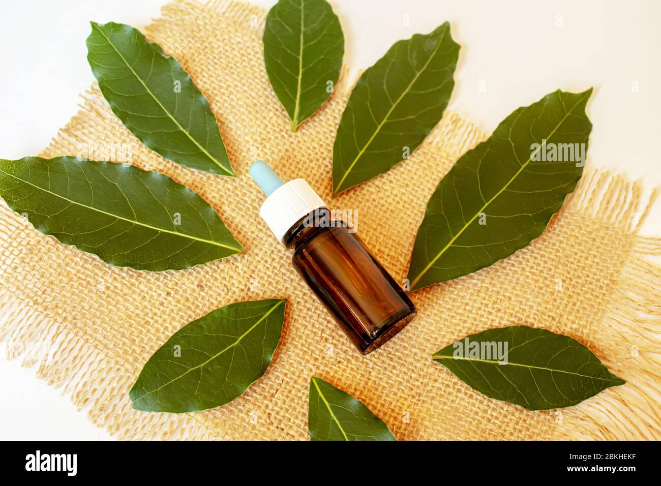 Tea tree essential oil in a small bottle. Selective focus.nature Stock ...