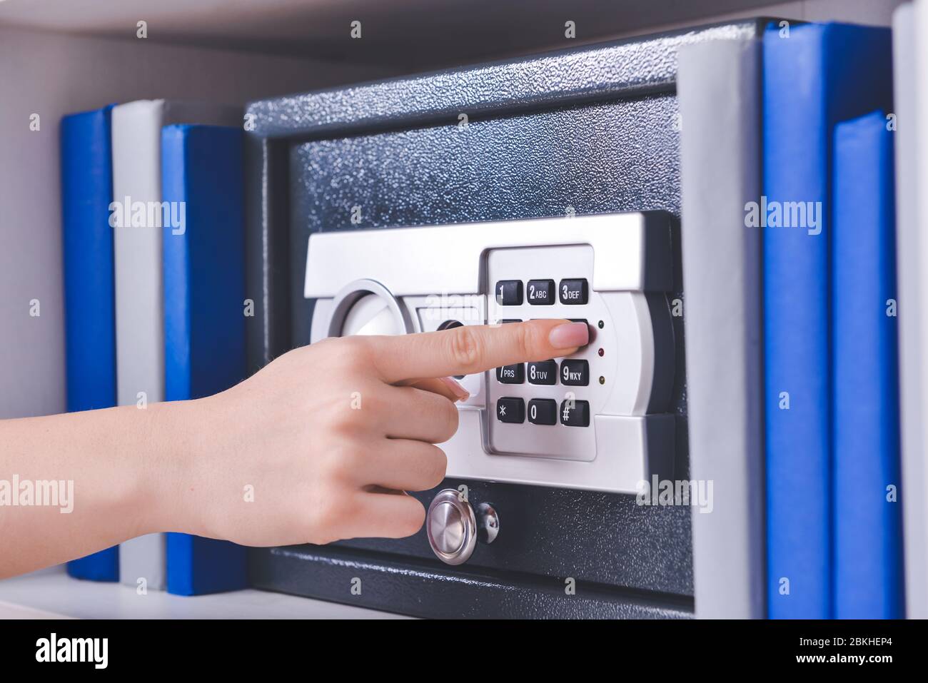 Opening locker hand hi-res stock photography and images - Alamy